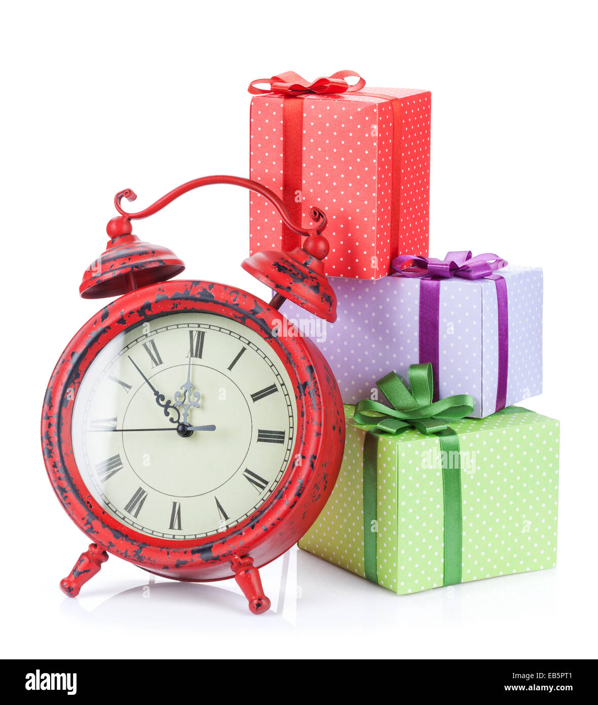 Christmas clock and three gift boxes. Isolated on white background ...