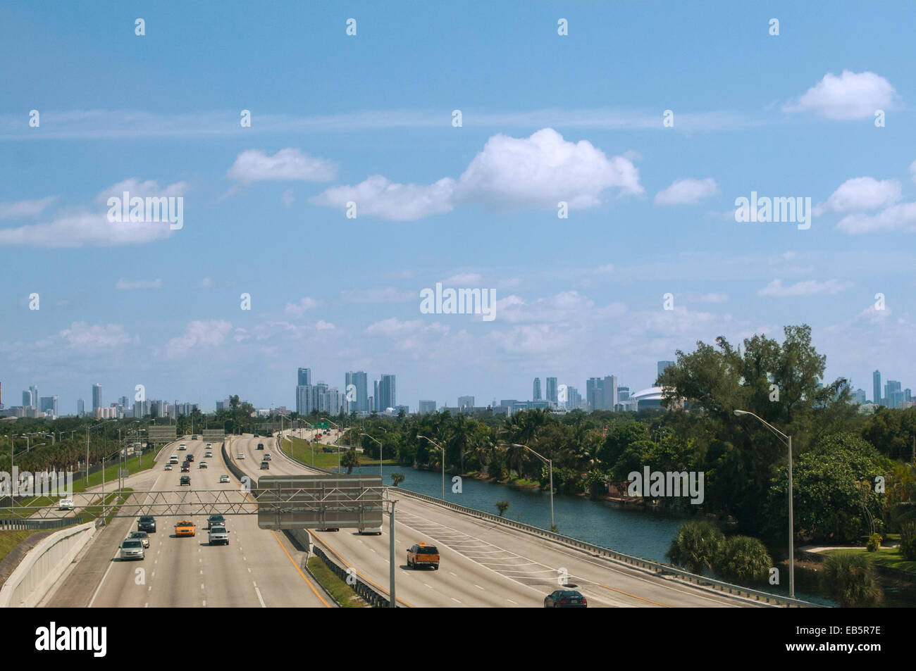 picture taken from a moving car presenting the highway towards downtown ...