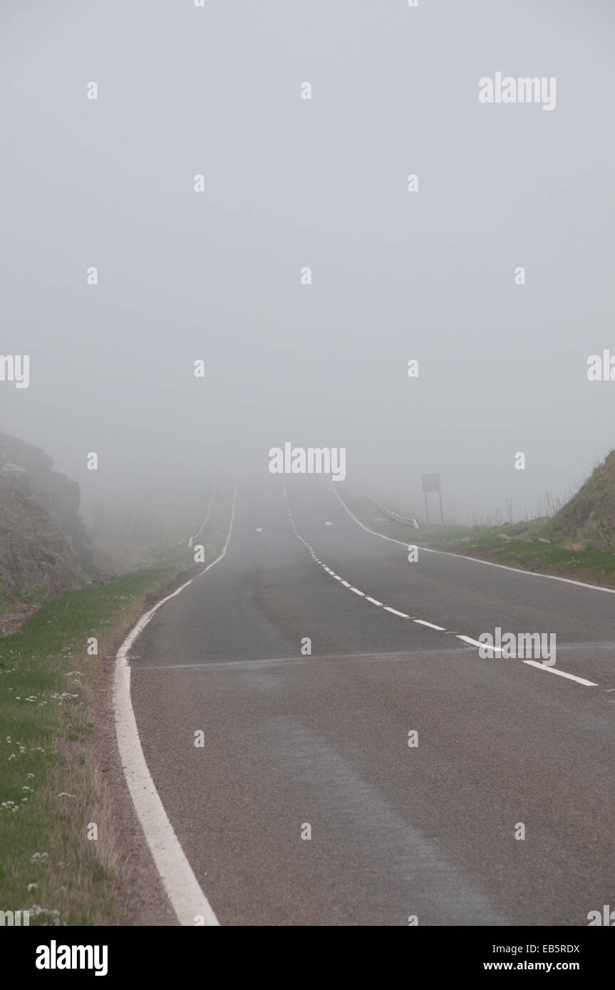 Road disappearing into the mist hi-res stock photography and images - Alamy