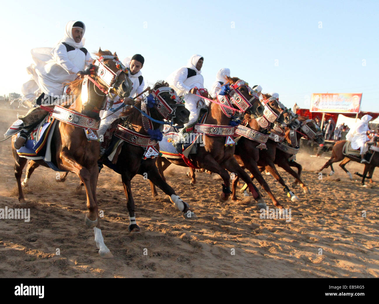 Tripoli, Libya. 26th Nov, 2014. Libyan horse riders wearing desert ...