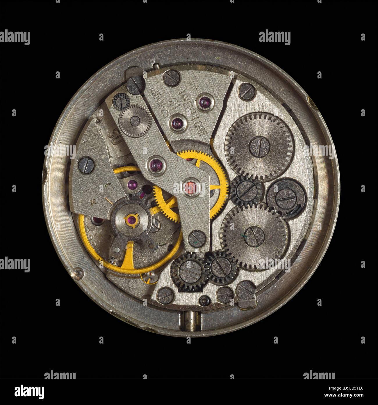 An old clockwork on a black background Stock Photo - Alamy