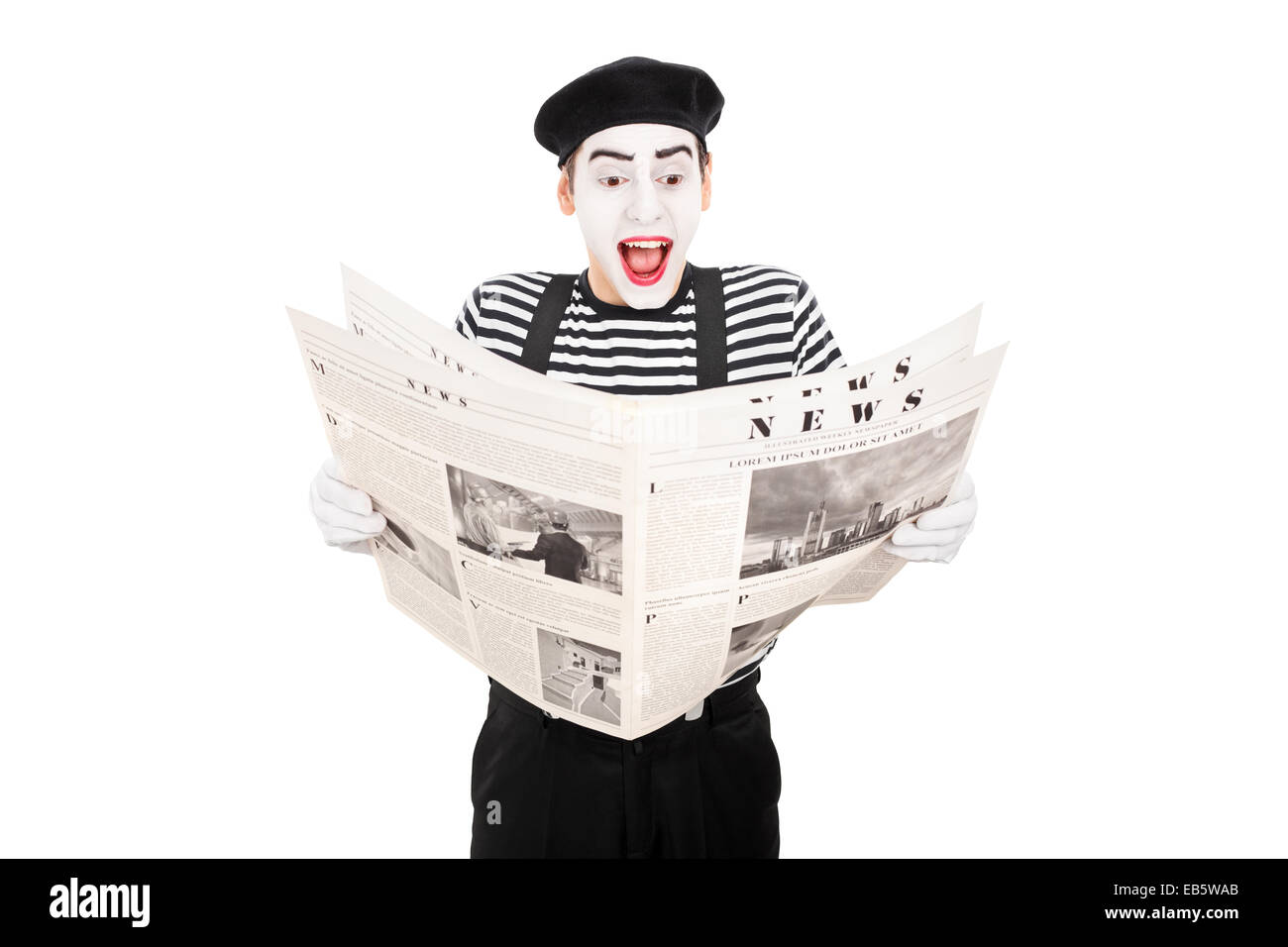 Male mime artist reading the news isolated on white background Stock ...