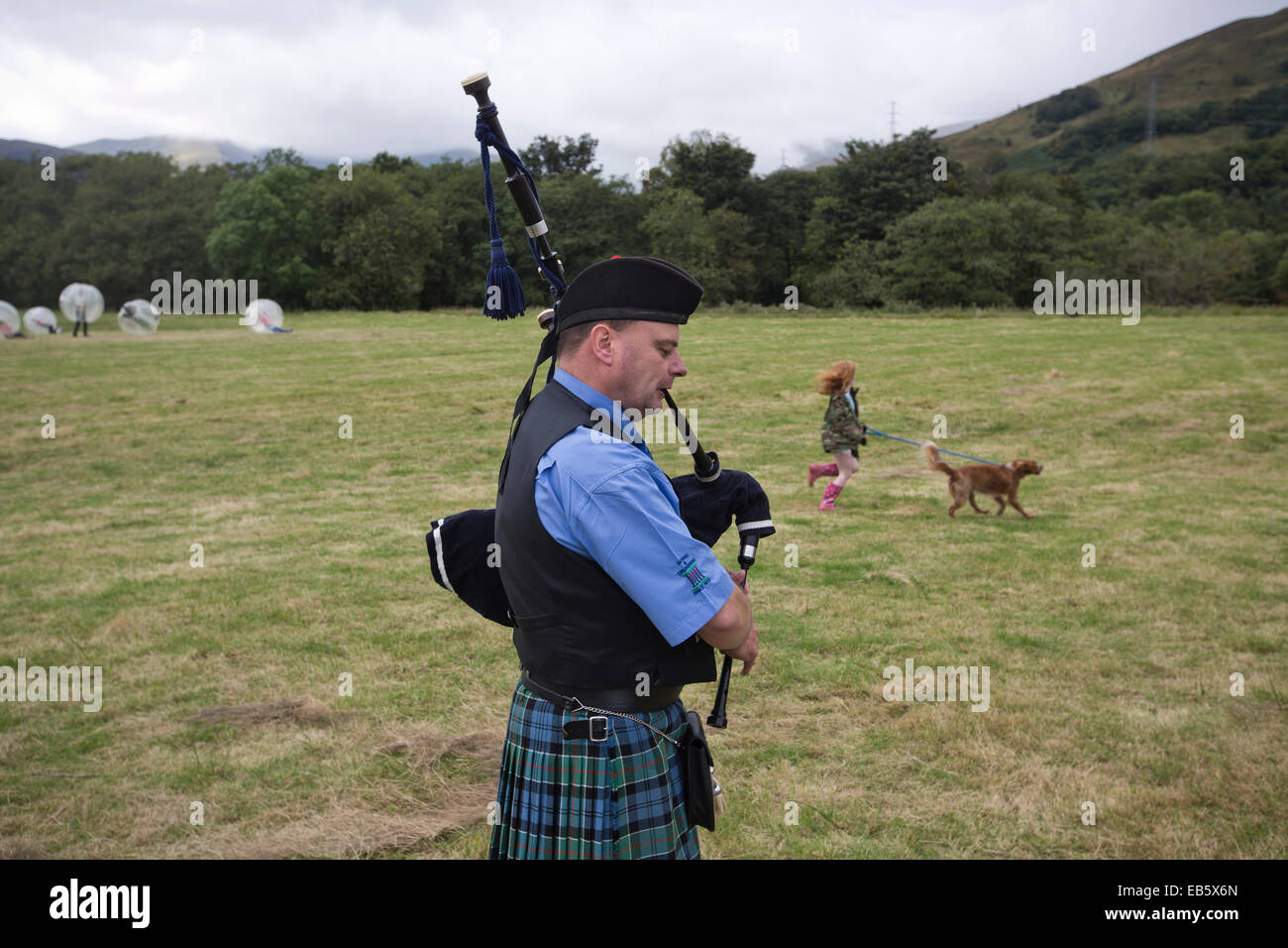 A member of a traditional Scottish pipe band playing at the Dalmally ...