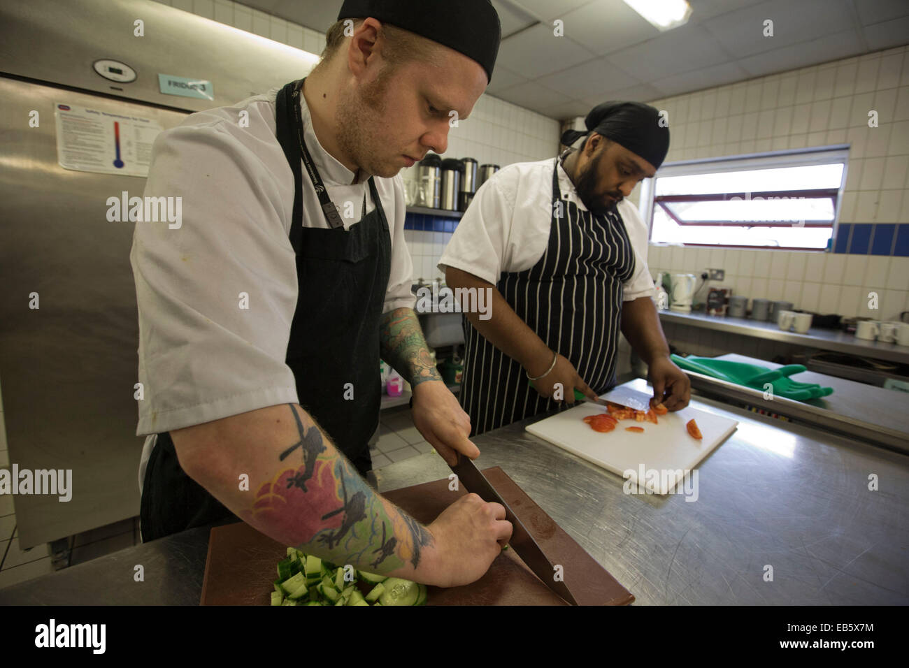 Top chefs Sukhdev Singh (right) and Adam Leavy preparing food for ...