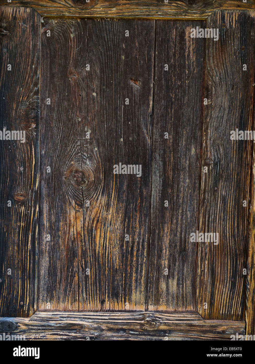 Close up on an old dark brown wood fence background texture Stock Photo ...