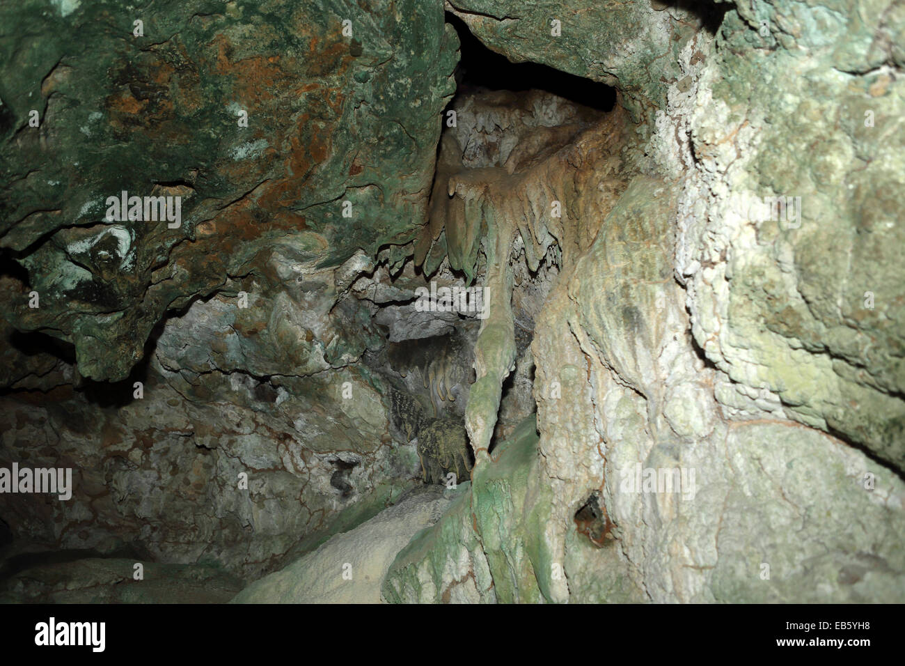 Limestone stalactites in a cave within the Kelim Karst Geoforest Park ...