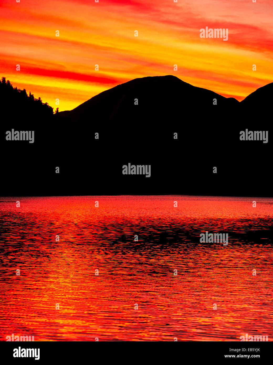 Sunset in NZ fiordland Stock Photo - Alamy