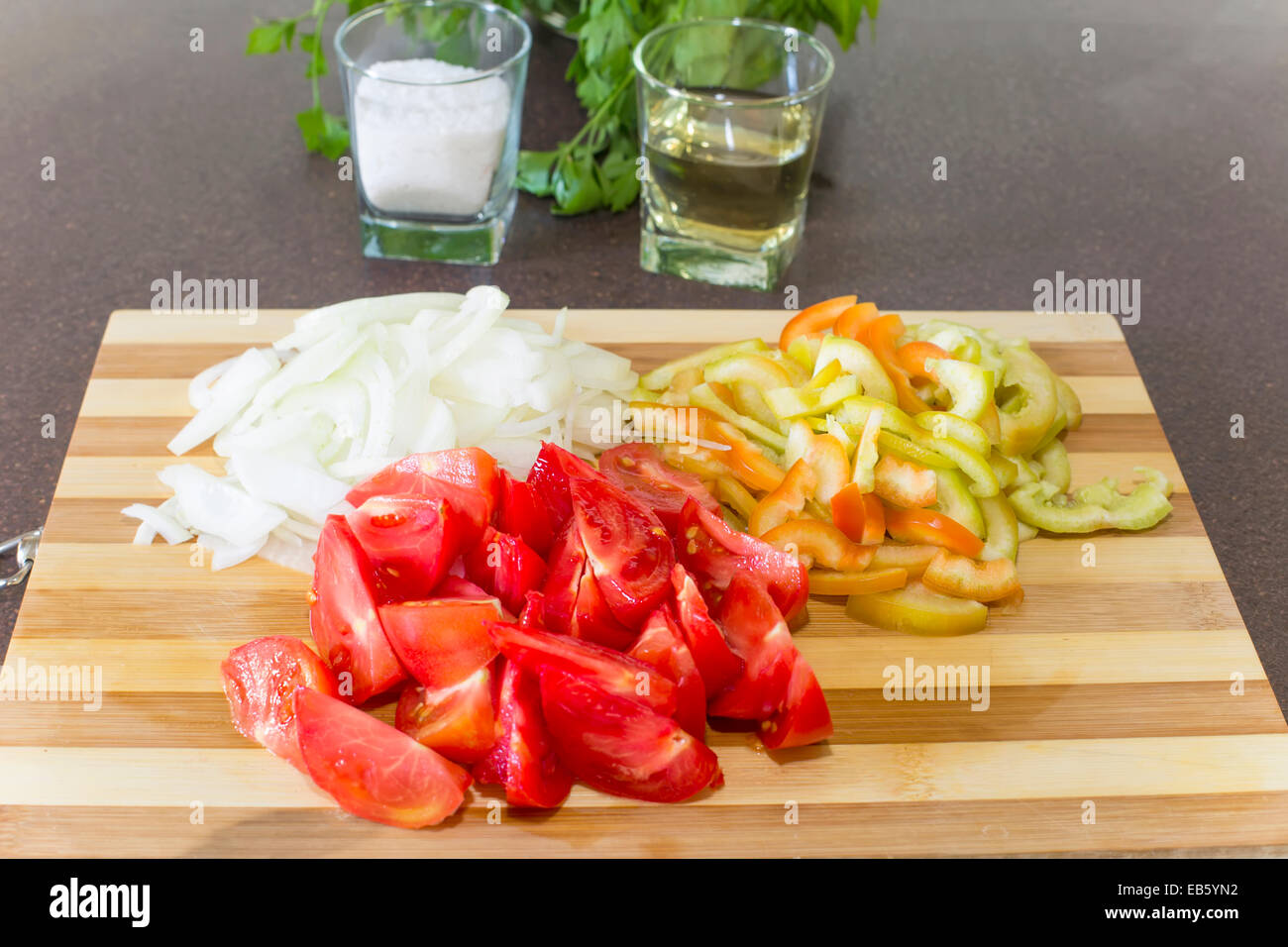 cutting fresh vegetables for cooking Stock Photo - Alamy