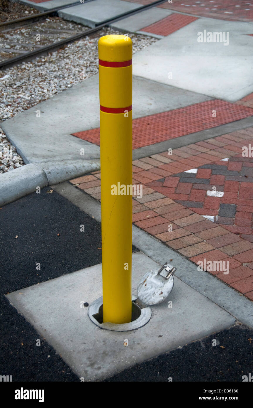 A traffic piling plugs into a permanently mounted receptacle for street ...