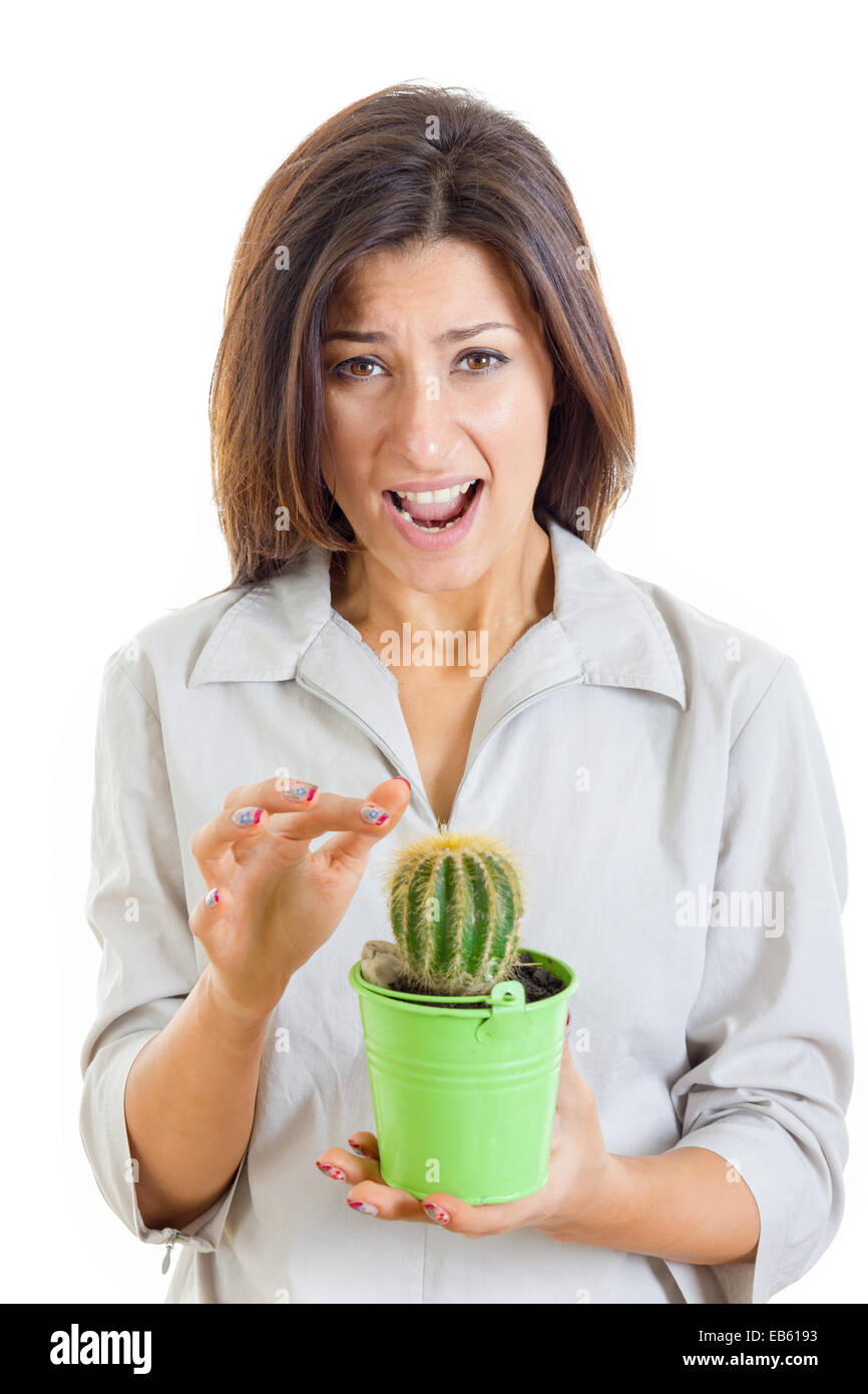 woman holding cactus plant and stabbed her finger with painful facial ...