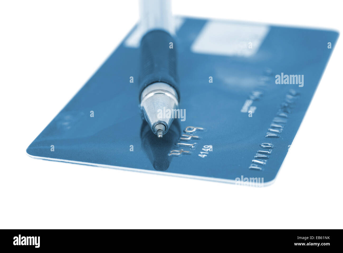 Credit card with pen isolated on white background Stock Photo - Alamy