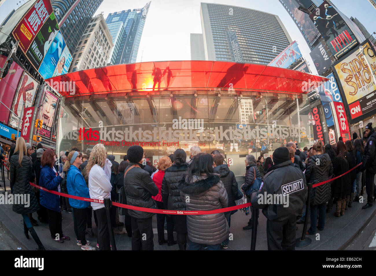 Visitors to the discount TKTS ticket booth in Times Square in New York ...