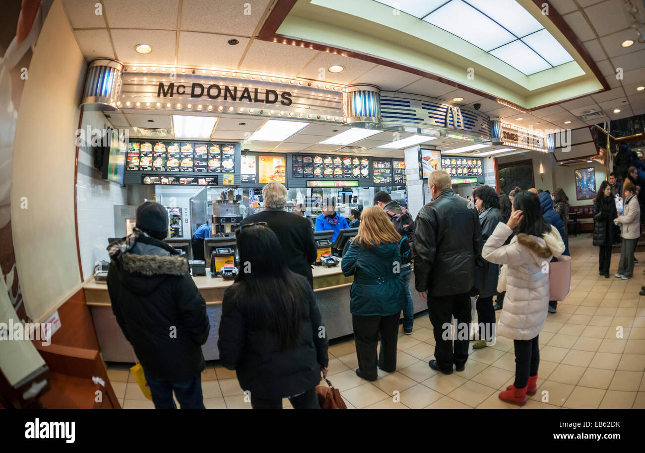 Customers order food at a McDonald's restaurant in Times Square Stock ...