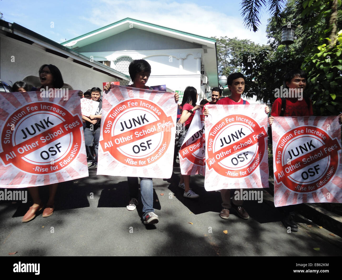 Students begin to march to Quezon Hall from the Executive House in ...
