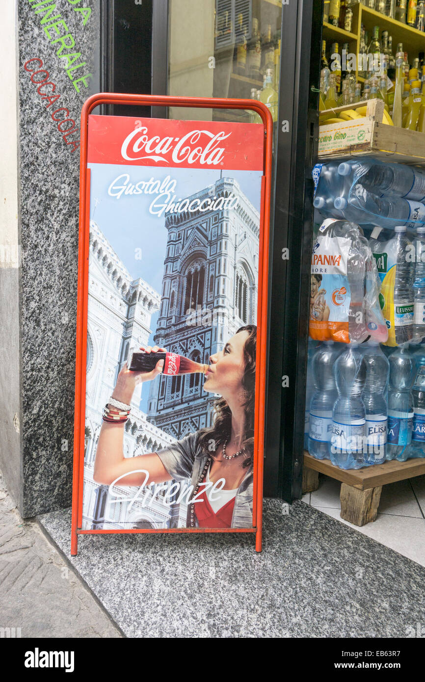 retro Coca Cola sign outside liquor store showing young woman sipping ...