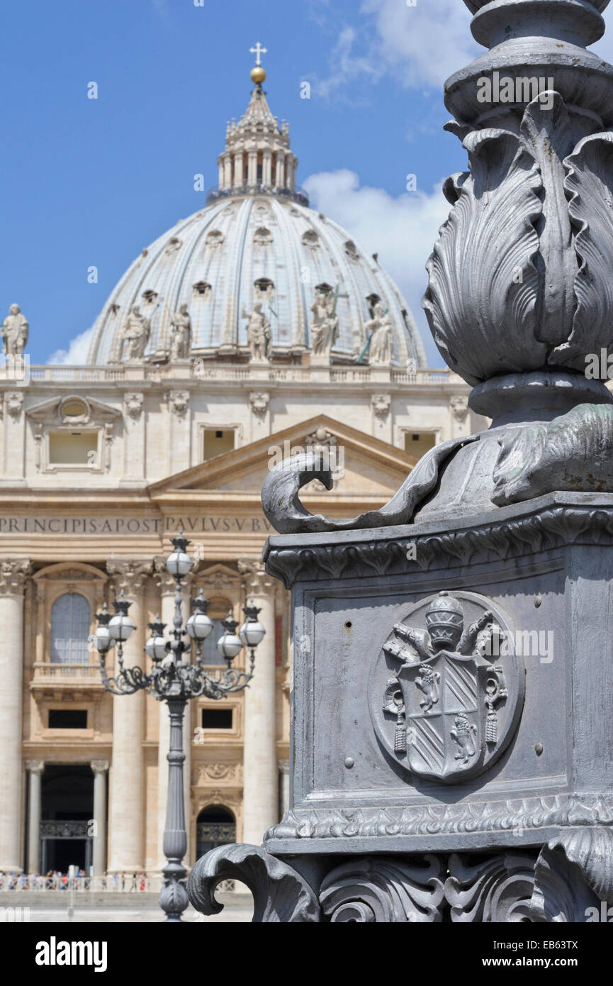 Closeup of a papal emblem on the base of a lamppost in the Vatican ...