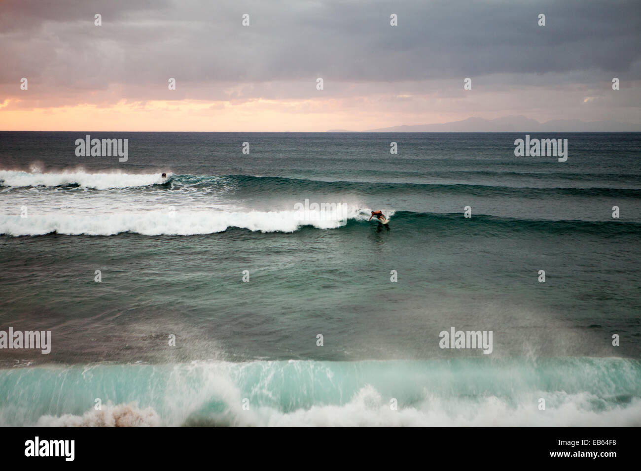 Surfing on Molokai Hawaii Stock Photo - Alamy