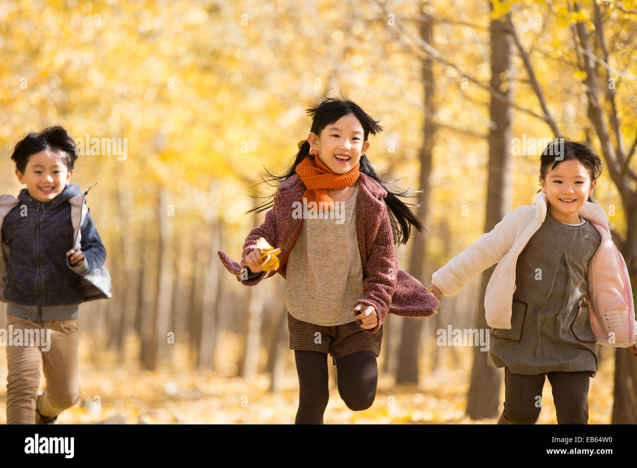 Child outdoor laughing running hi-res stock photography and images - Alamy