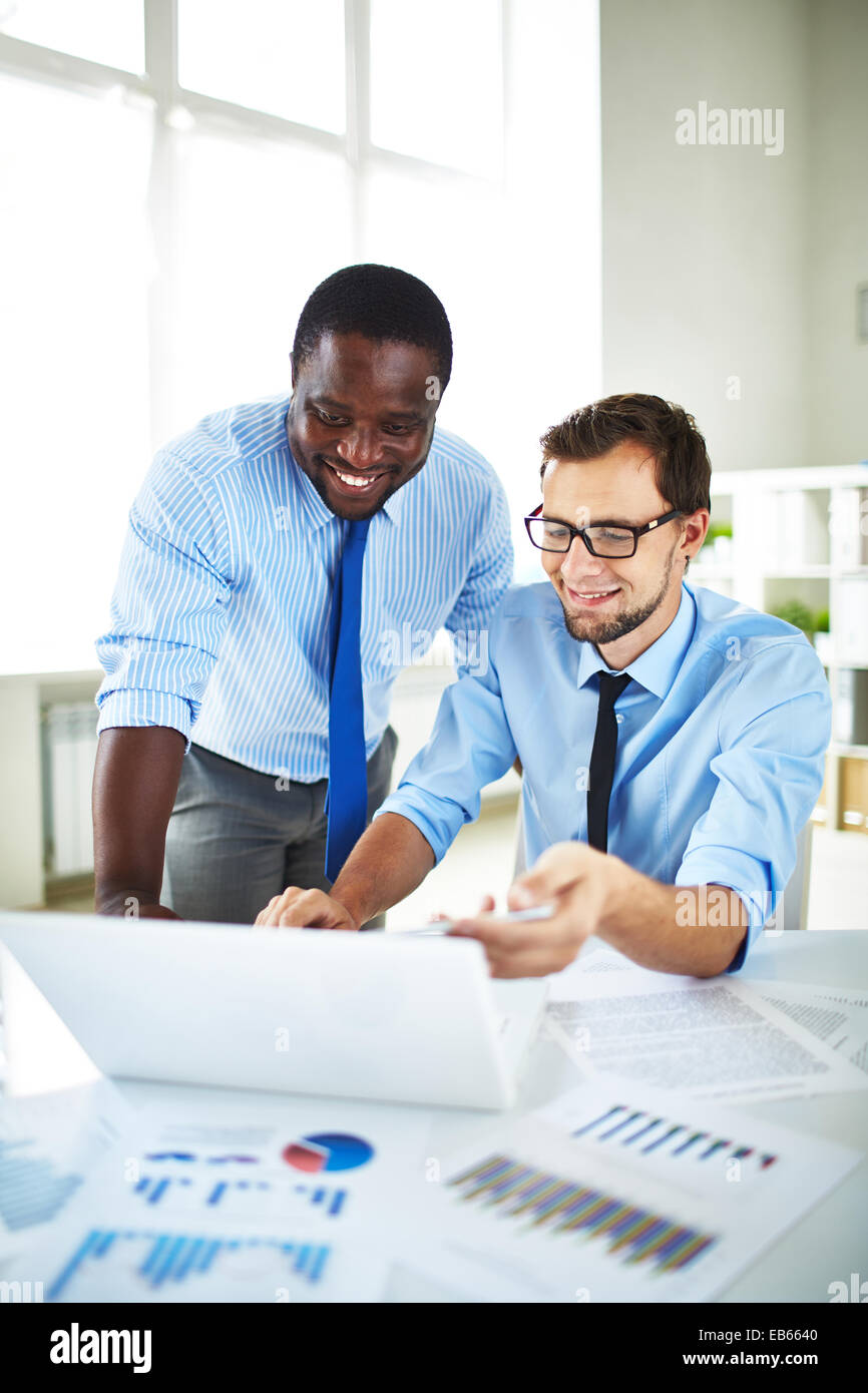 Two men talking during work Stock Photo - Alamy