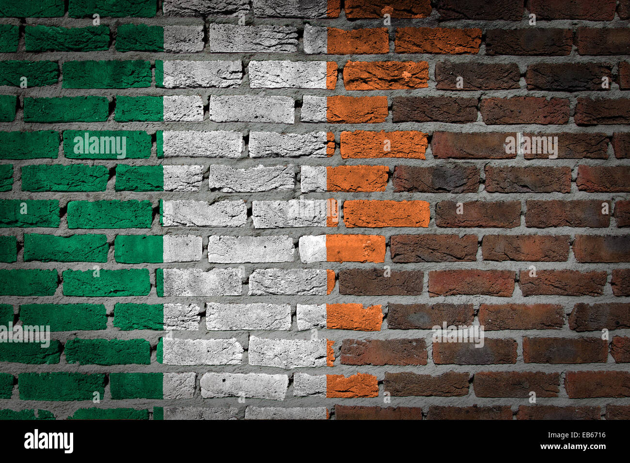 Very old dark red brick wall texture with flag - Ireland Stock Photo ...
