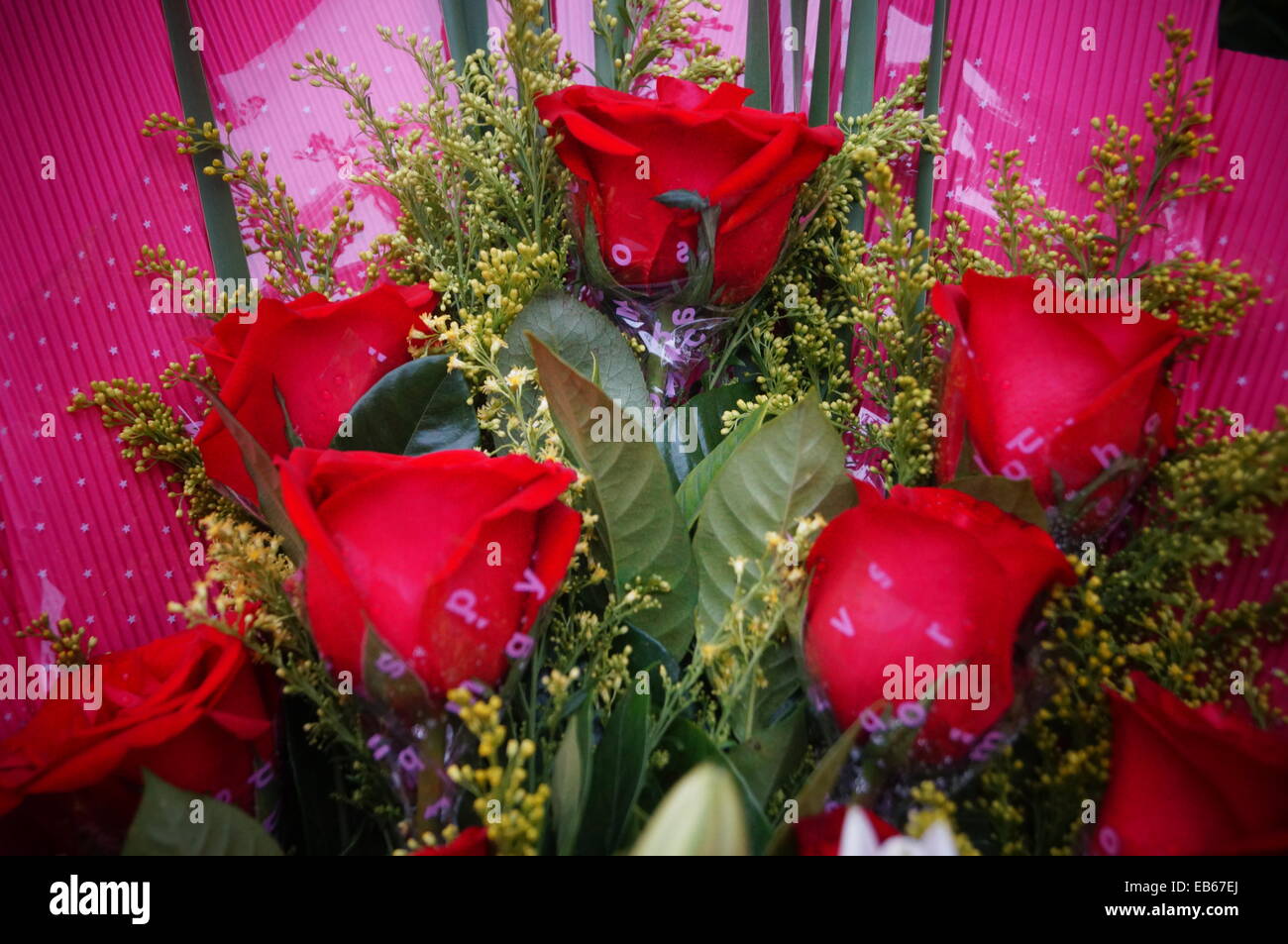 Rose, on display in a flower shop, ready to sell Stock Photo - Alamy