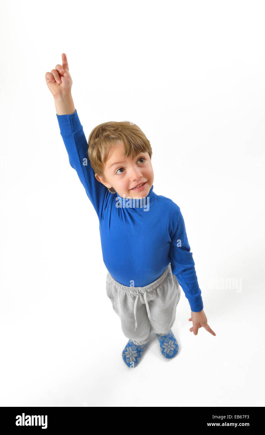 isolated little boy pointing upwards Stock Photo - Alamy
