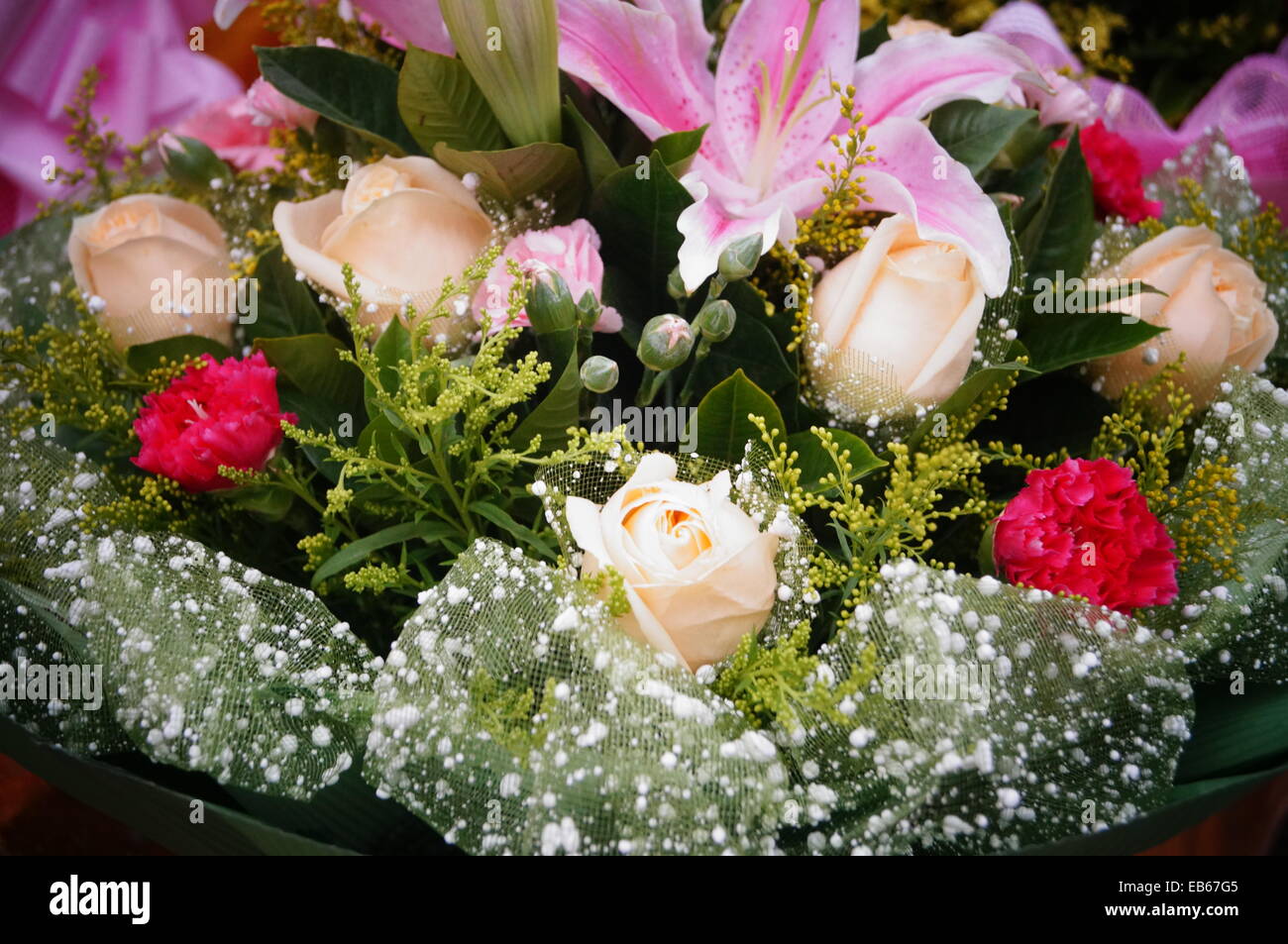 Rose, on display in a flower shop, ready to sell Stock Photo - Alamy