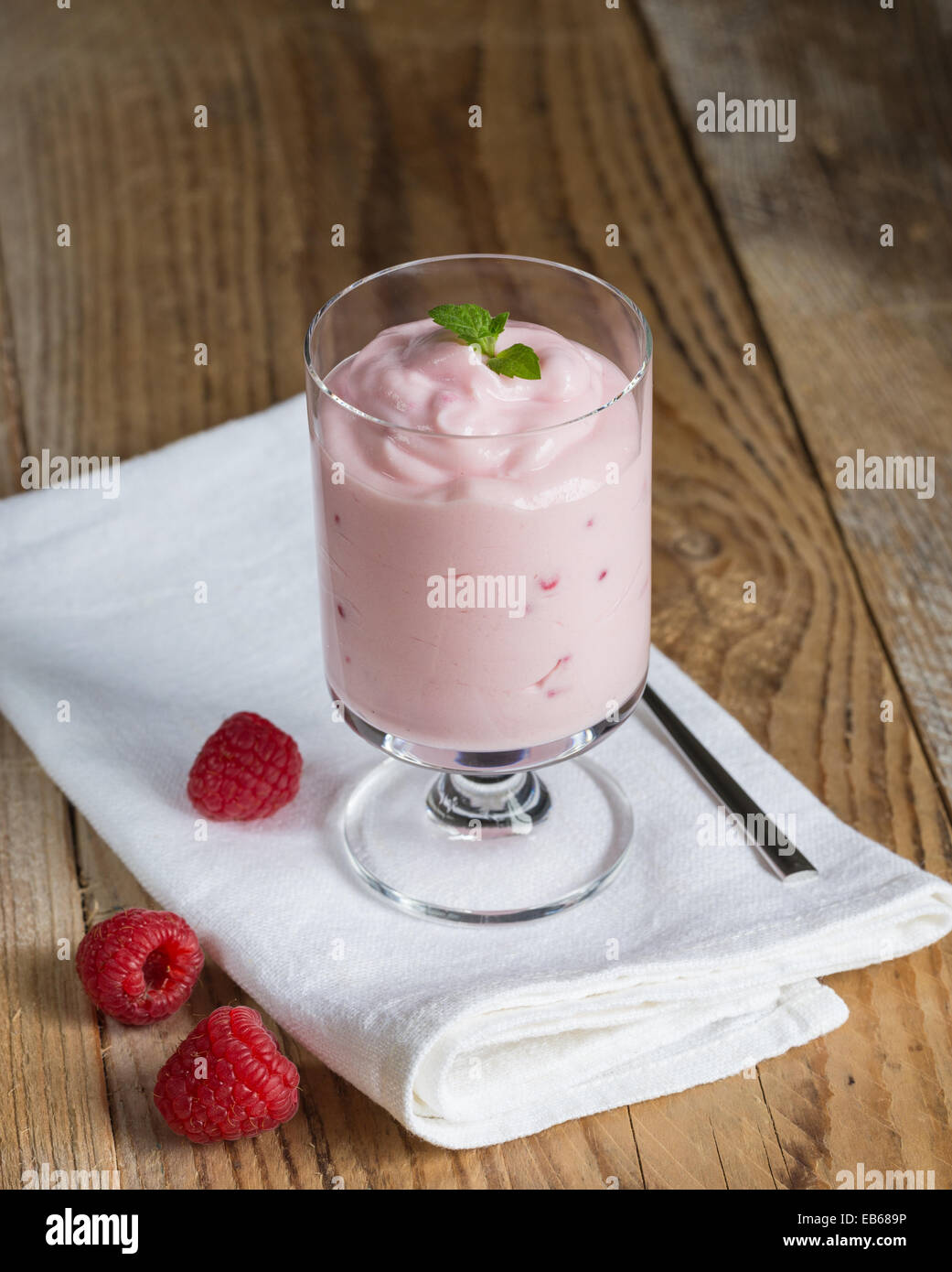 Raspberry cream dessert with mint Stock Photo - Alamy