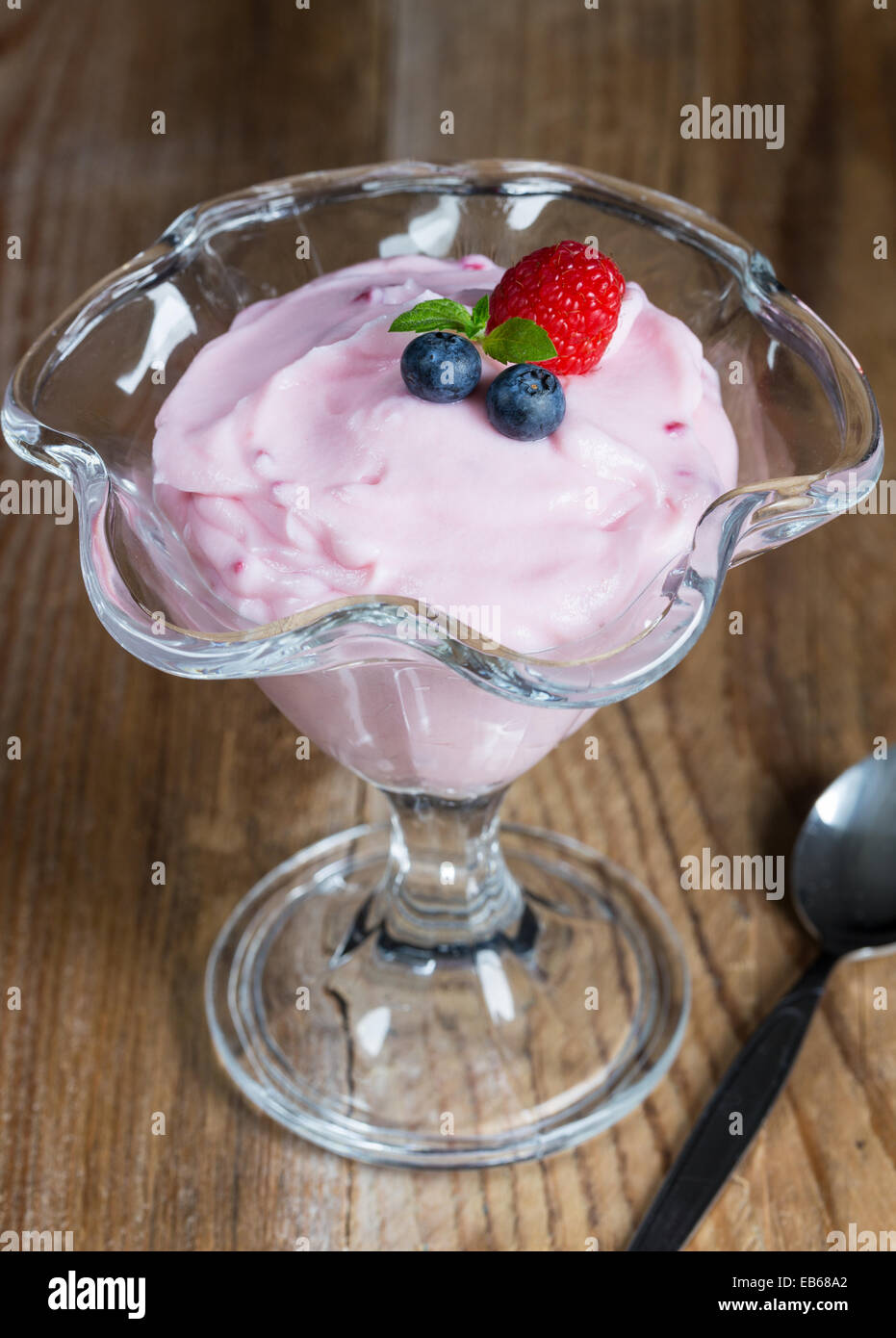 Raspberry cream dessert with mint Stock Photo - Alamy