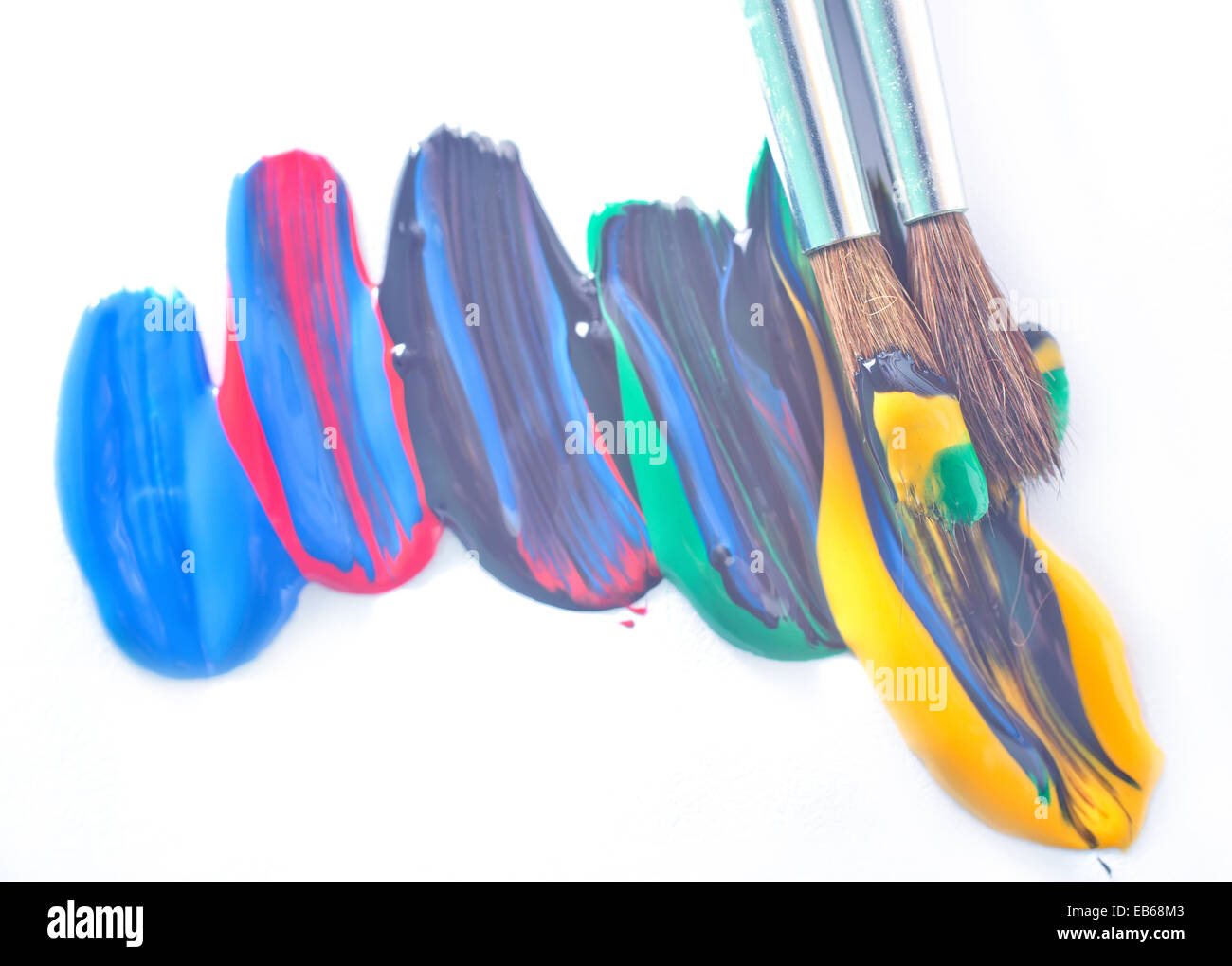 Gouache brushes white canvas Cut Out Stock Images & Pictures - Alamy