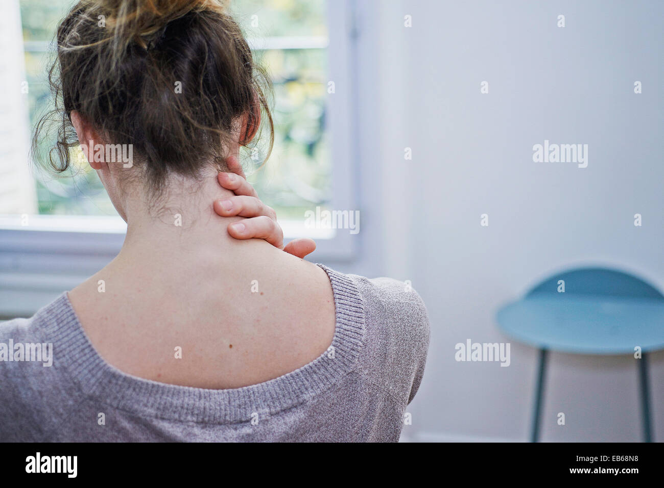 WOMAN WITH CERVICALGIA Stock Photo - Alamy