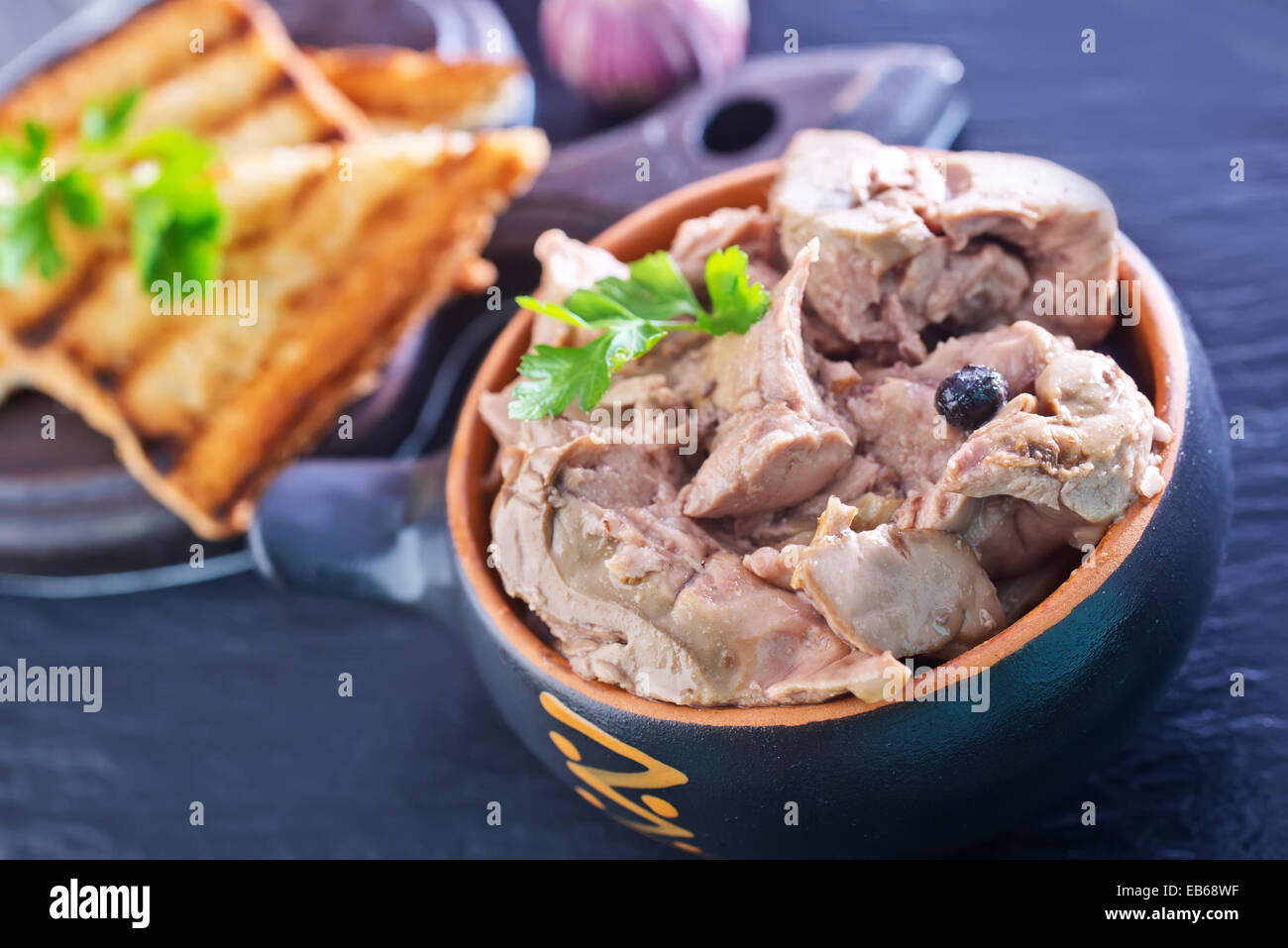 liver of cod in the glass bank and on a table Stock Photo - Alamy