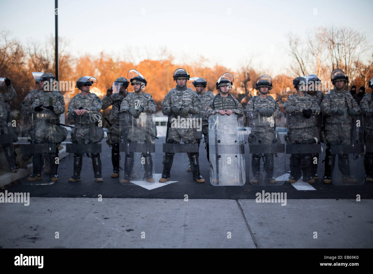 Ferguson, USA. 26th Nov, 2014. U.S. National Guard stand guard outside ...