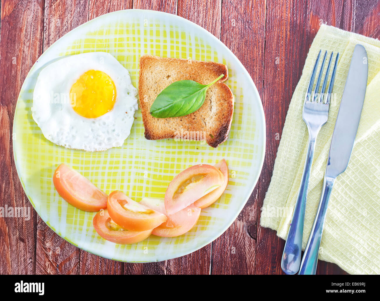 breakfast on plate, fried eggs and toasts Stock Photo - Alamy