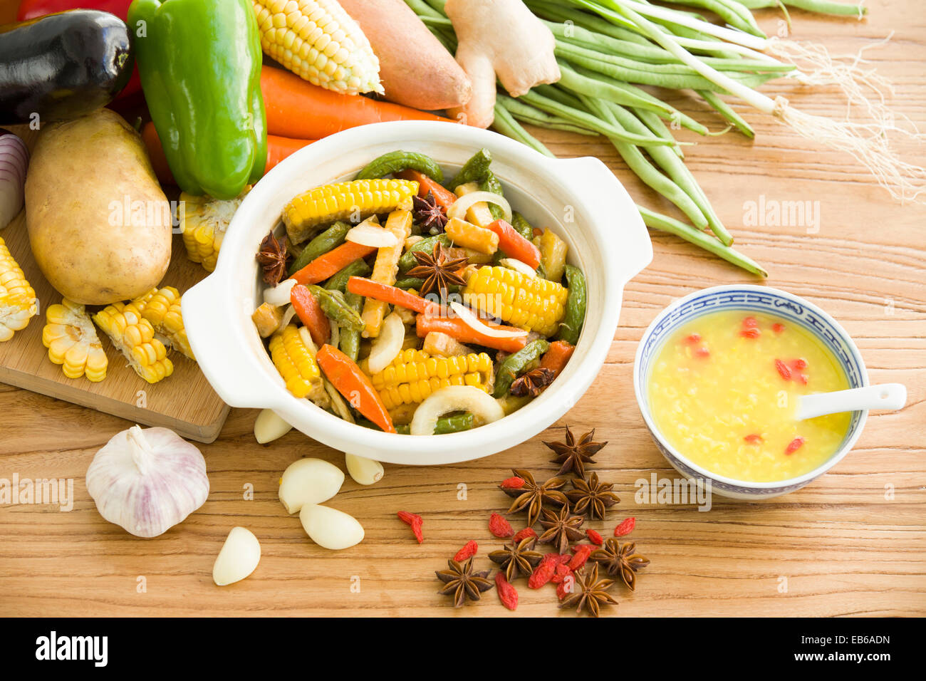 Assorted vegetables and cooked vegetable dish Stock Photo - Alamy