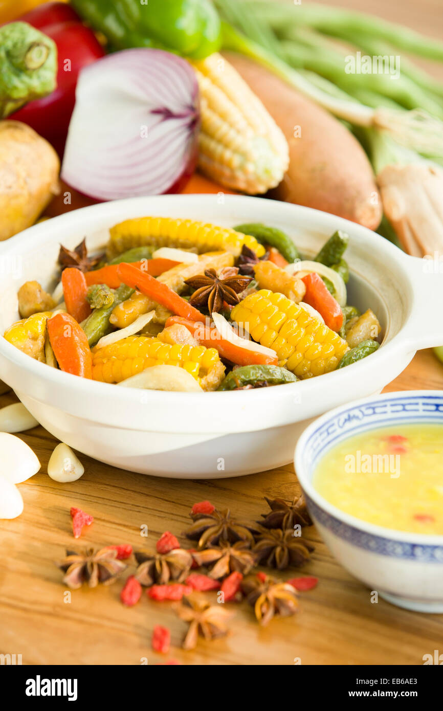 Assorted vegetables and cooked vegetable dish Stock Photo - Alamy