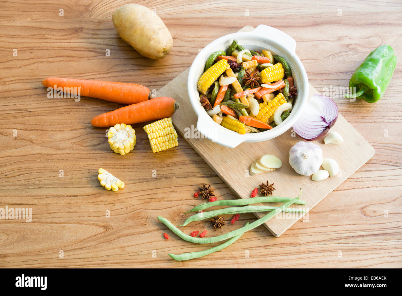 Assorted vegetables and cooked vegetable dish Stock Photo - Alamy