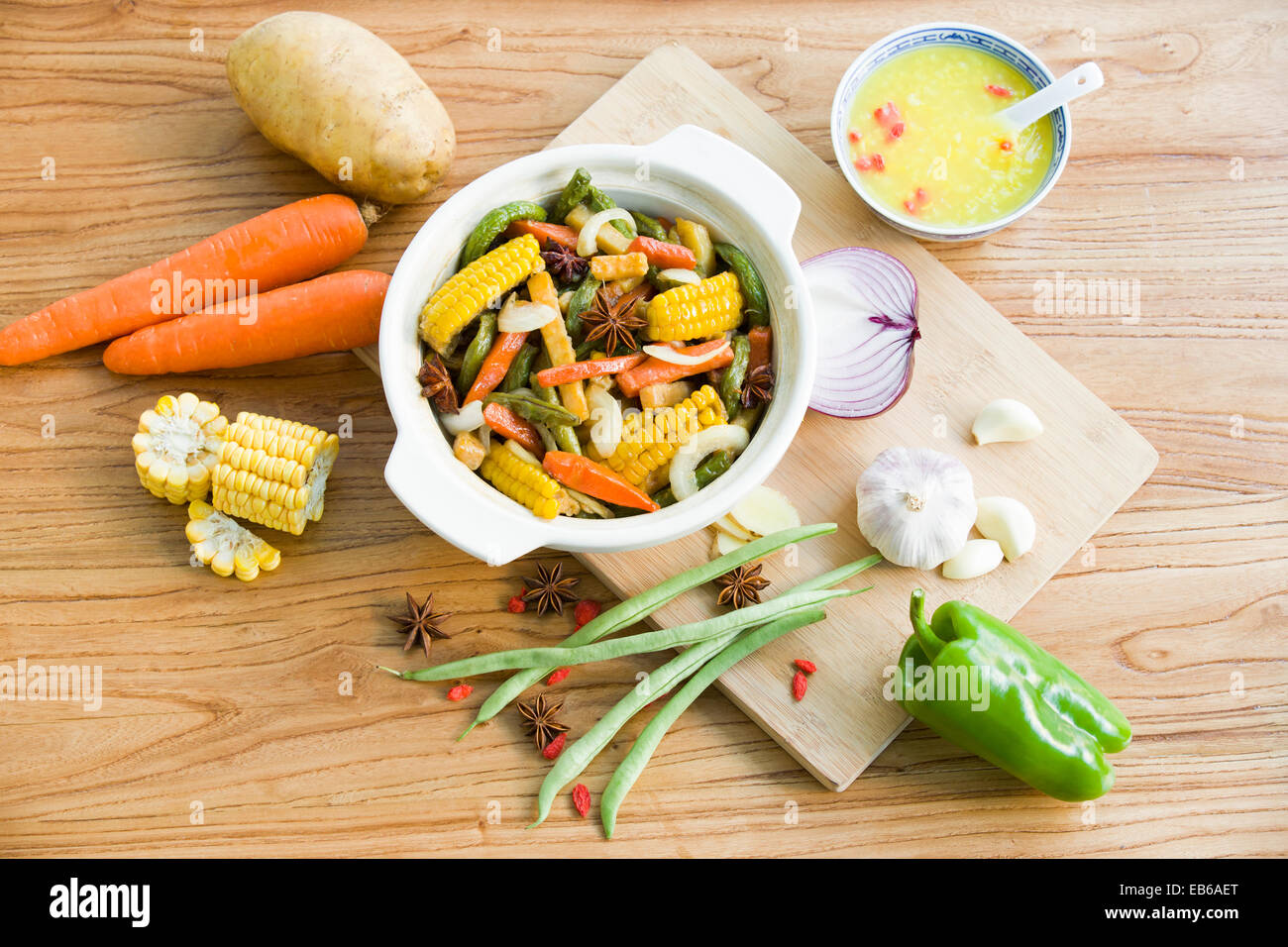 Assorted vegetables and cooked vegetable dish Stock Photo - Alamy