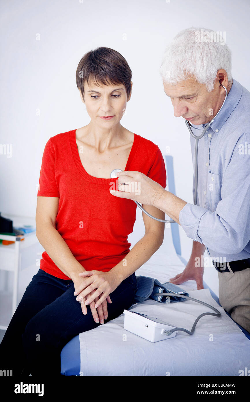 Auscultation woman cardiac hi-res stock photography and images - Alamy