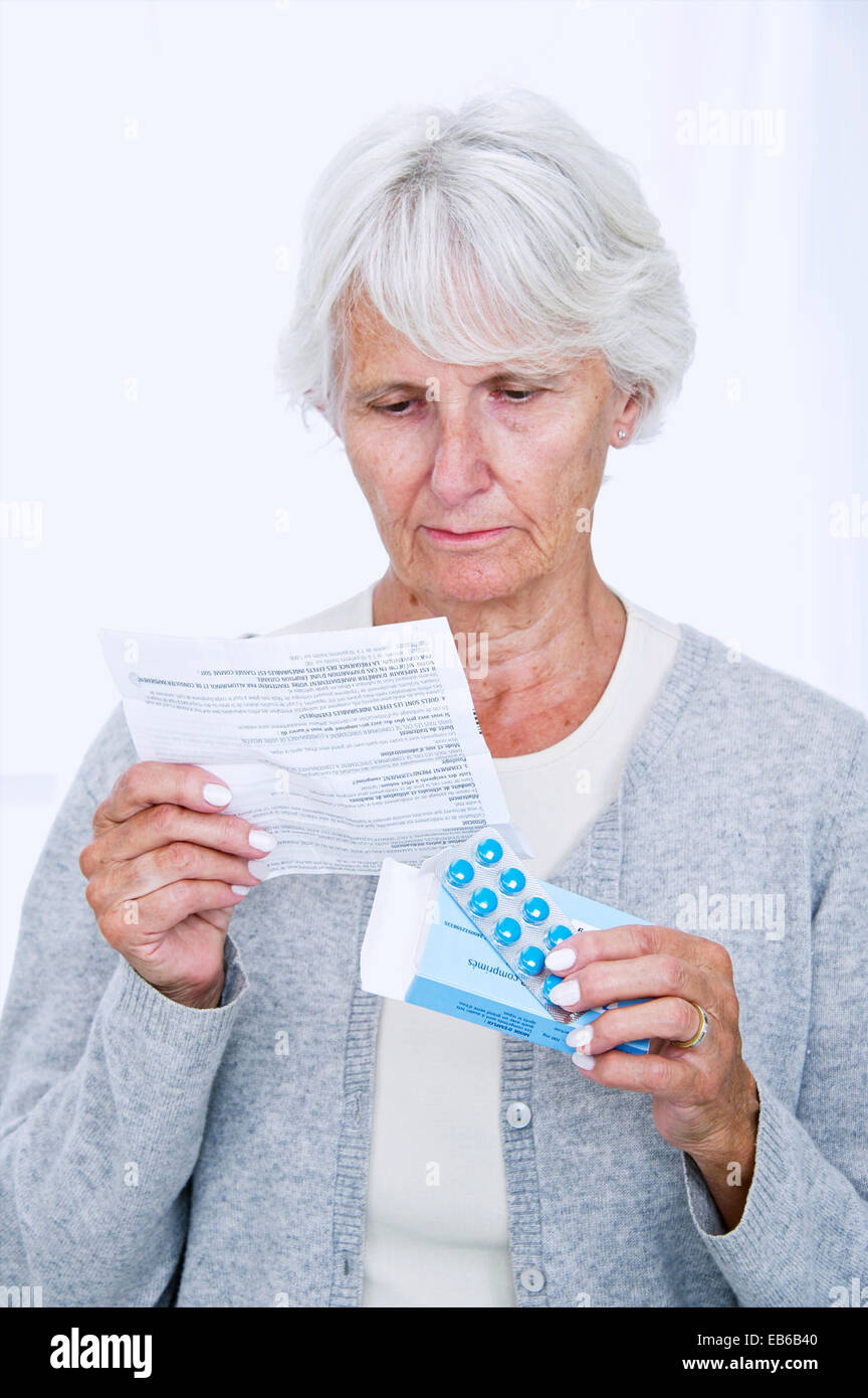 SENIOR TAKING MEDICATION Stock Photo - Alamy