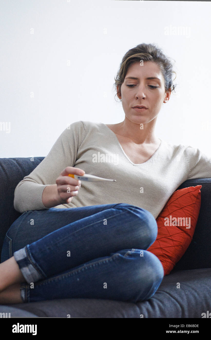 WOMAN WITH FEVER Stock Photo - Alamy