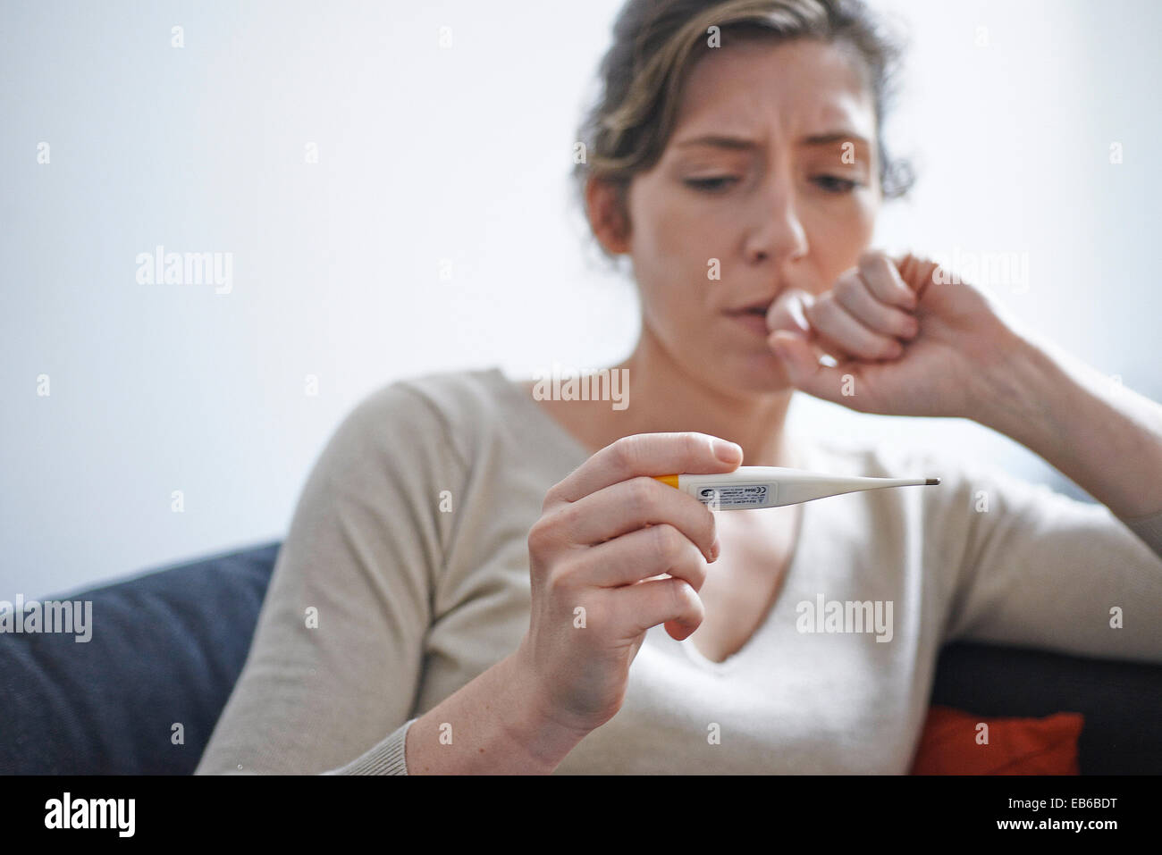 WOMAN WITH FEVER Stock Photo - Alamy