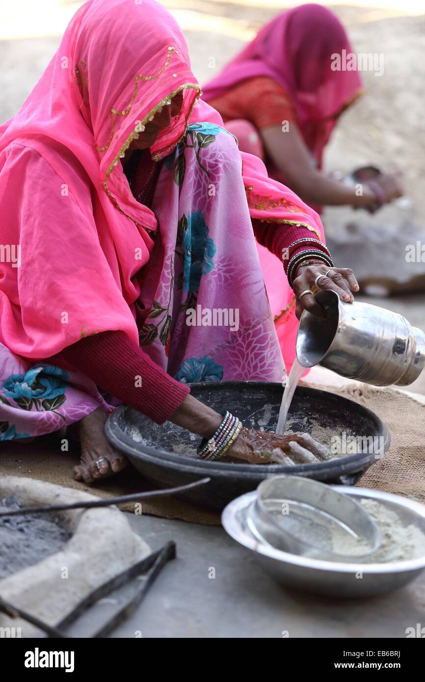 Indian woman preparing food hi-res stock photography and images - Alamy