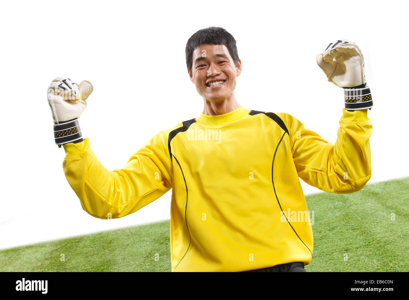 An exciting goalkeeper with open arms Stock Photo - Alamy