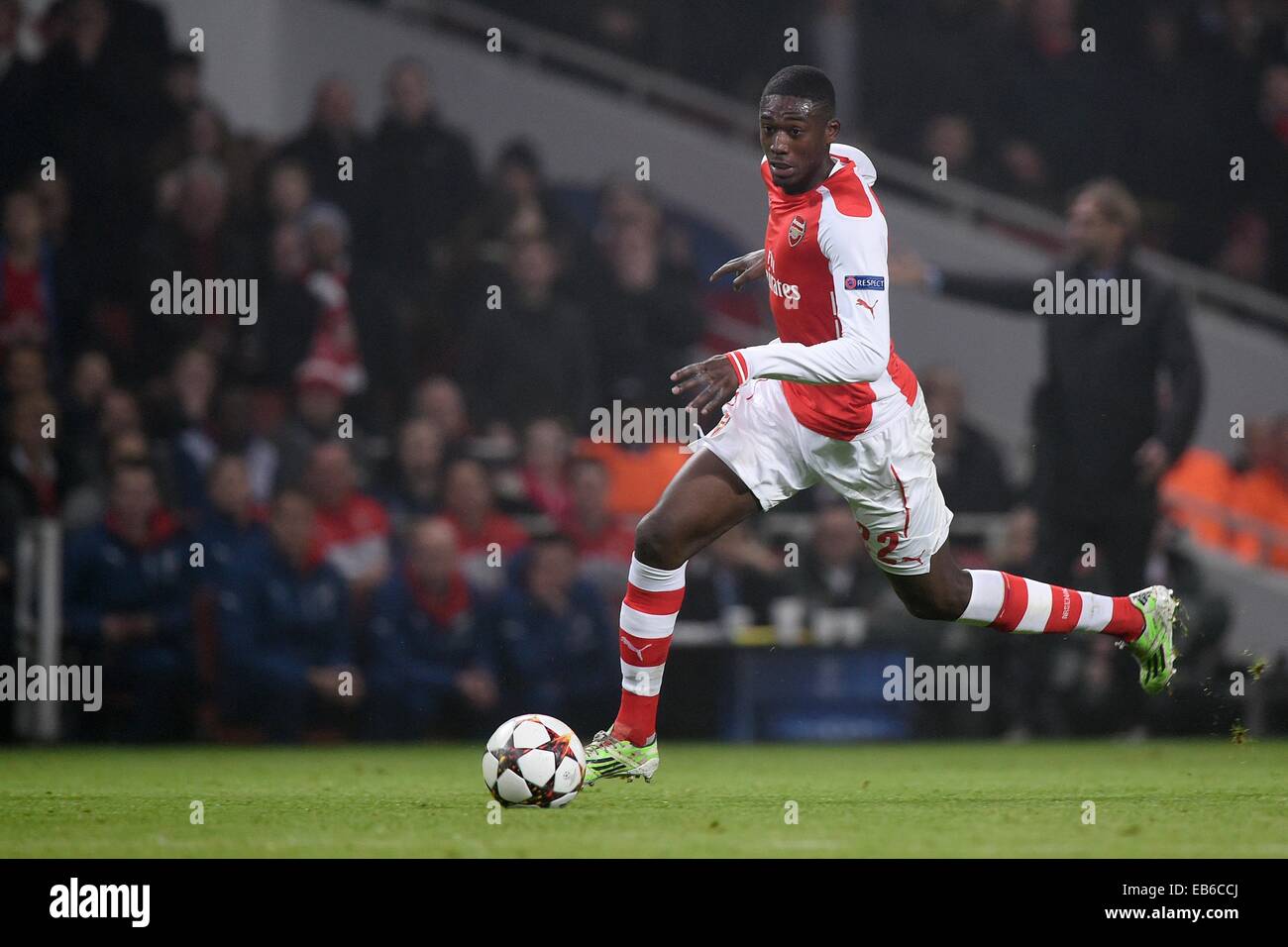 Arsenal's Yaya Sanogo controls the ball during the UEFA Champions ...