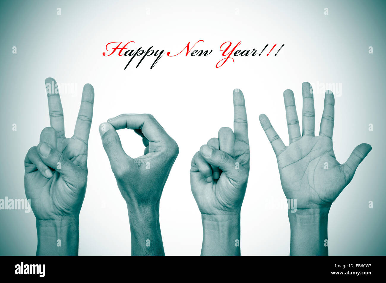 the text happy new year and man hands in black and white forming the ...