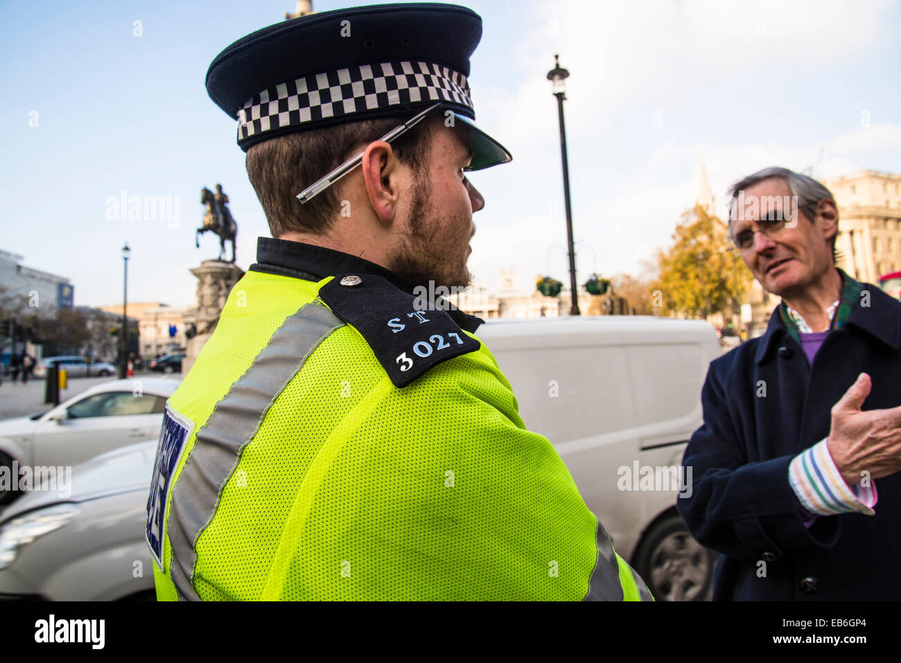 Man asking information from a policeman, London, England, UK Stock ...