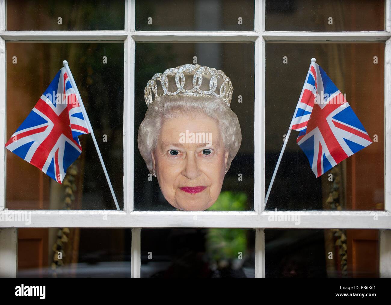 window decoration for the Diamond Jubilee with a mask of the Queen and ...