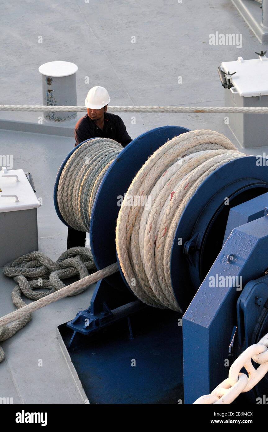 Cruise ship. Sailor working Stock Photo - Alamy