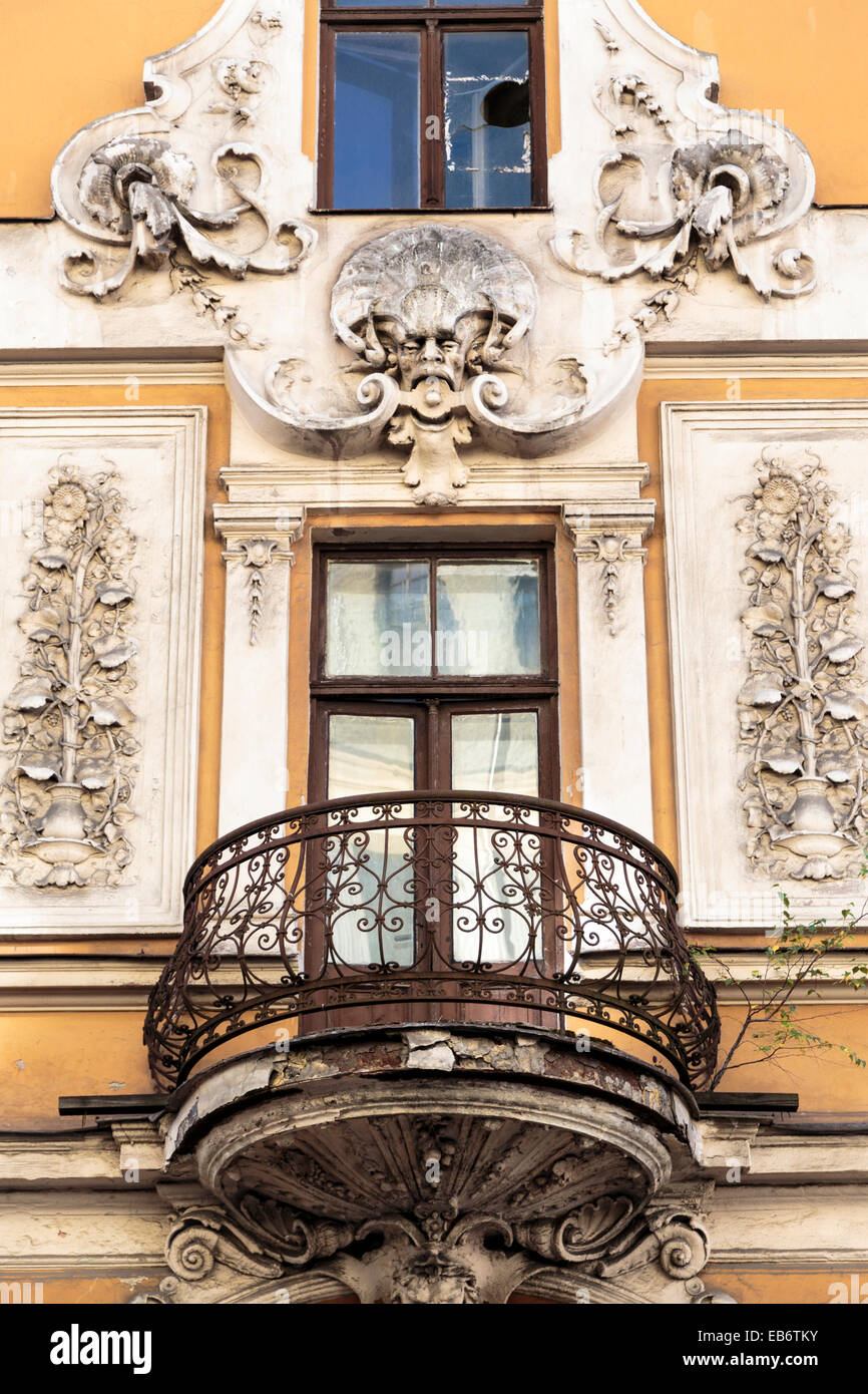 Window of dilapidated Art Nouveau building on Vilandes Iela, Riga ...